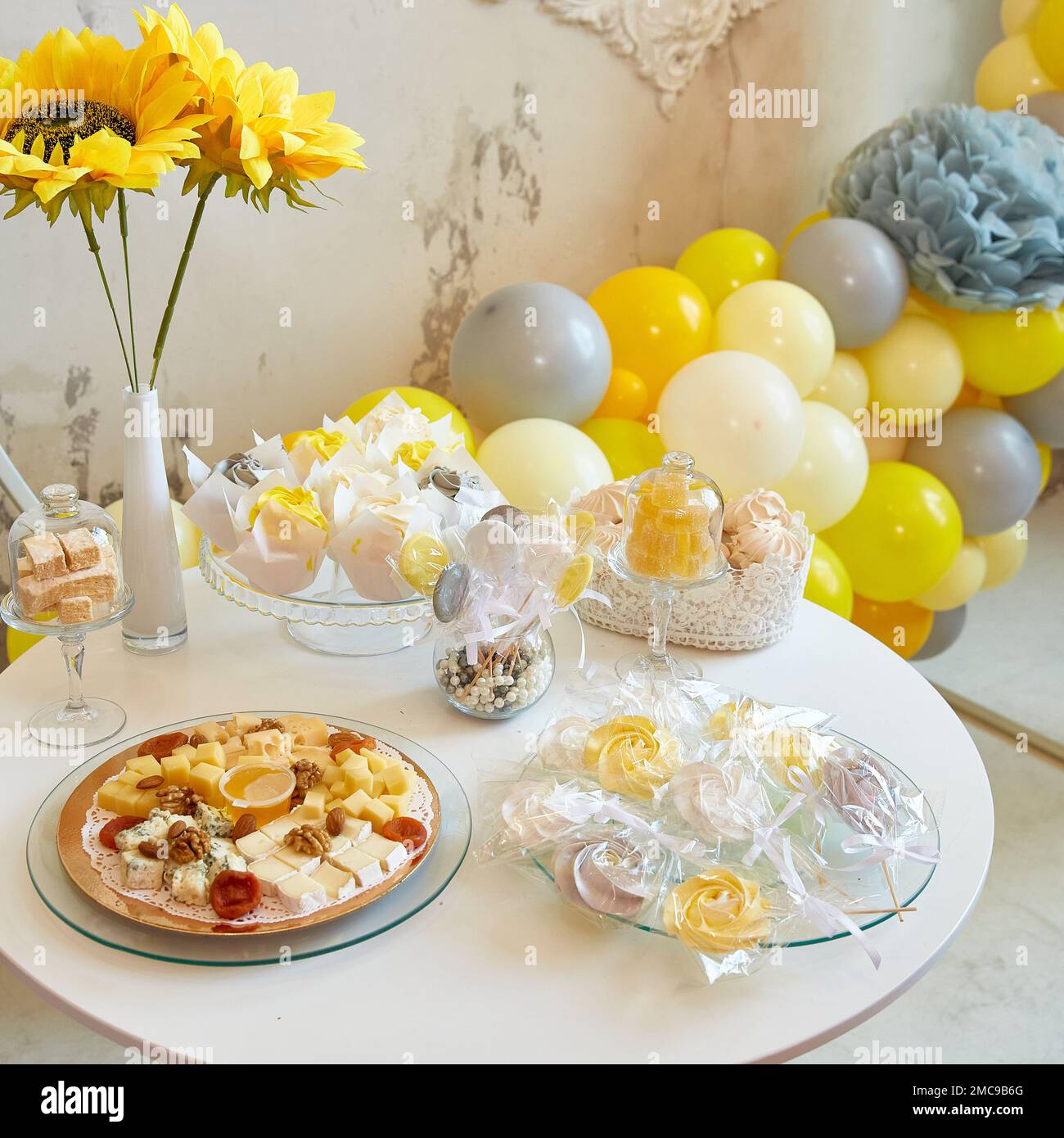 Delicious sweet holiday buffet with cupcakes, meringues and other ...