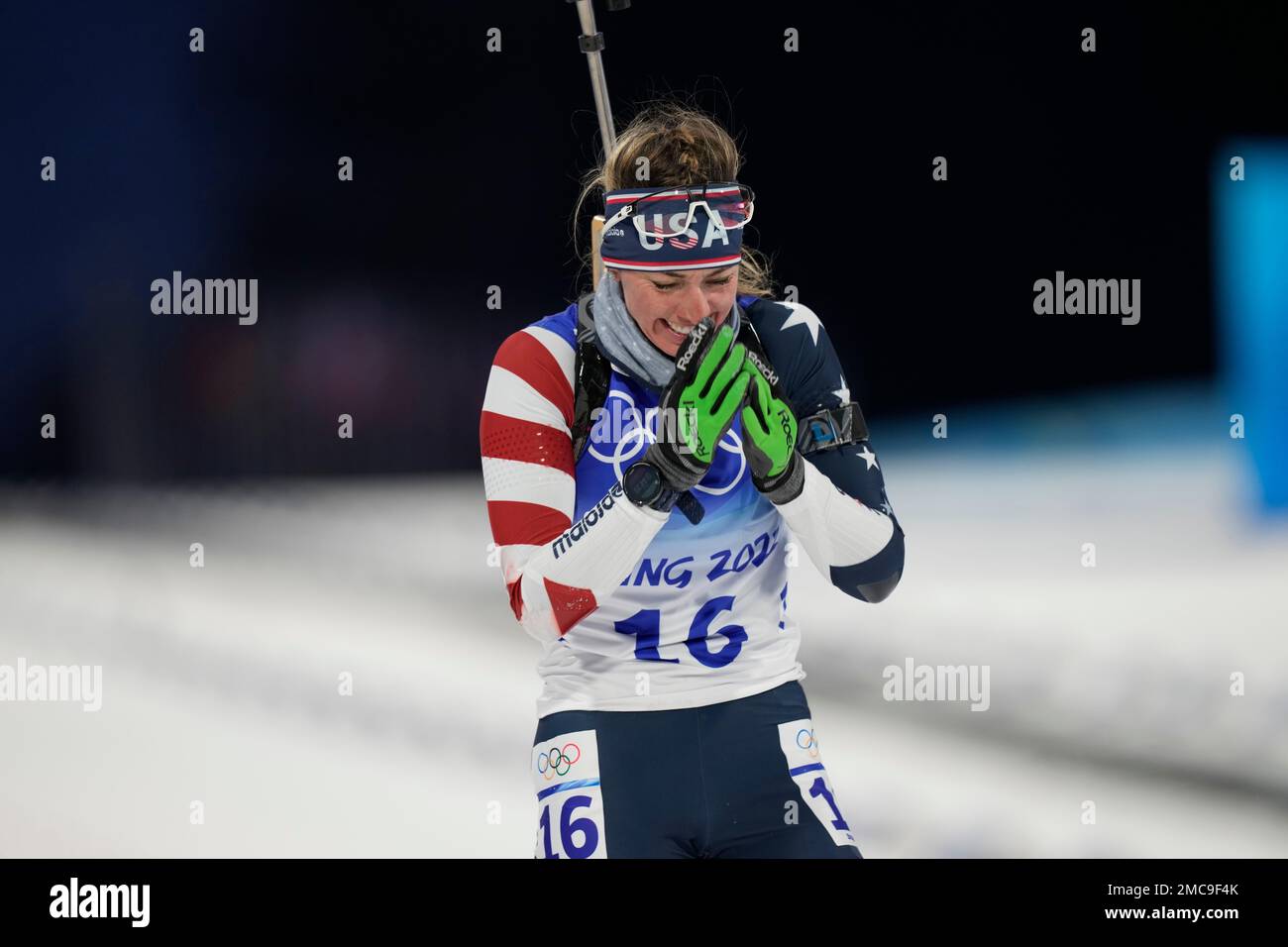 Deedra Irwin reacts after finishing the women's 15-kilometer individual ...