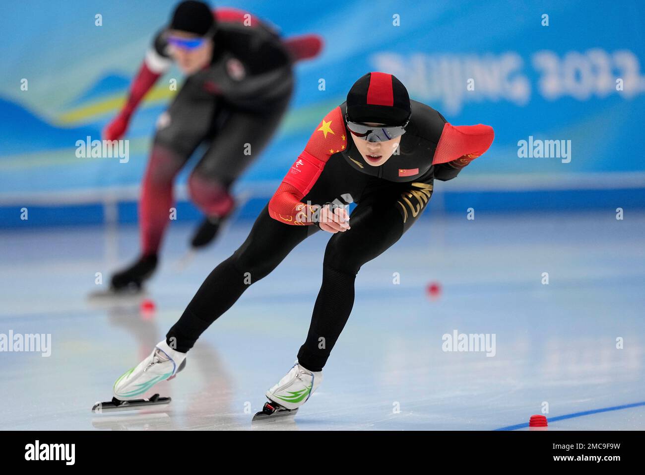 Ahenaer Adake of China competes against Maddison Pearman of Canada in ...