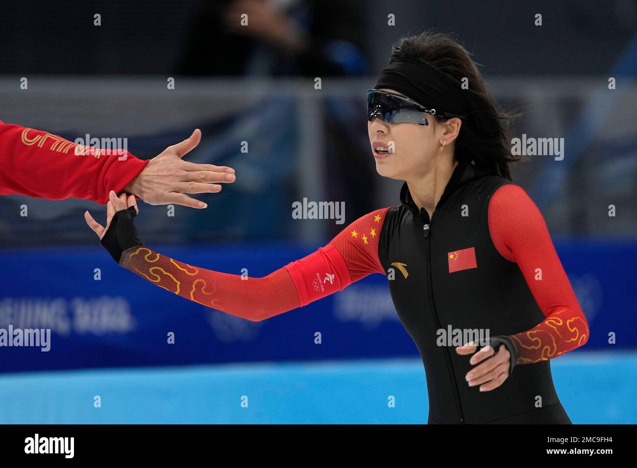 Ahenaer Adake of China reacts after her heat in the women's ...