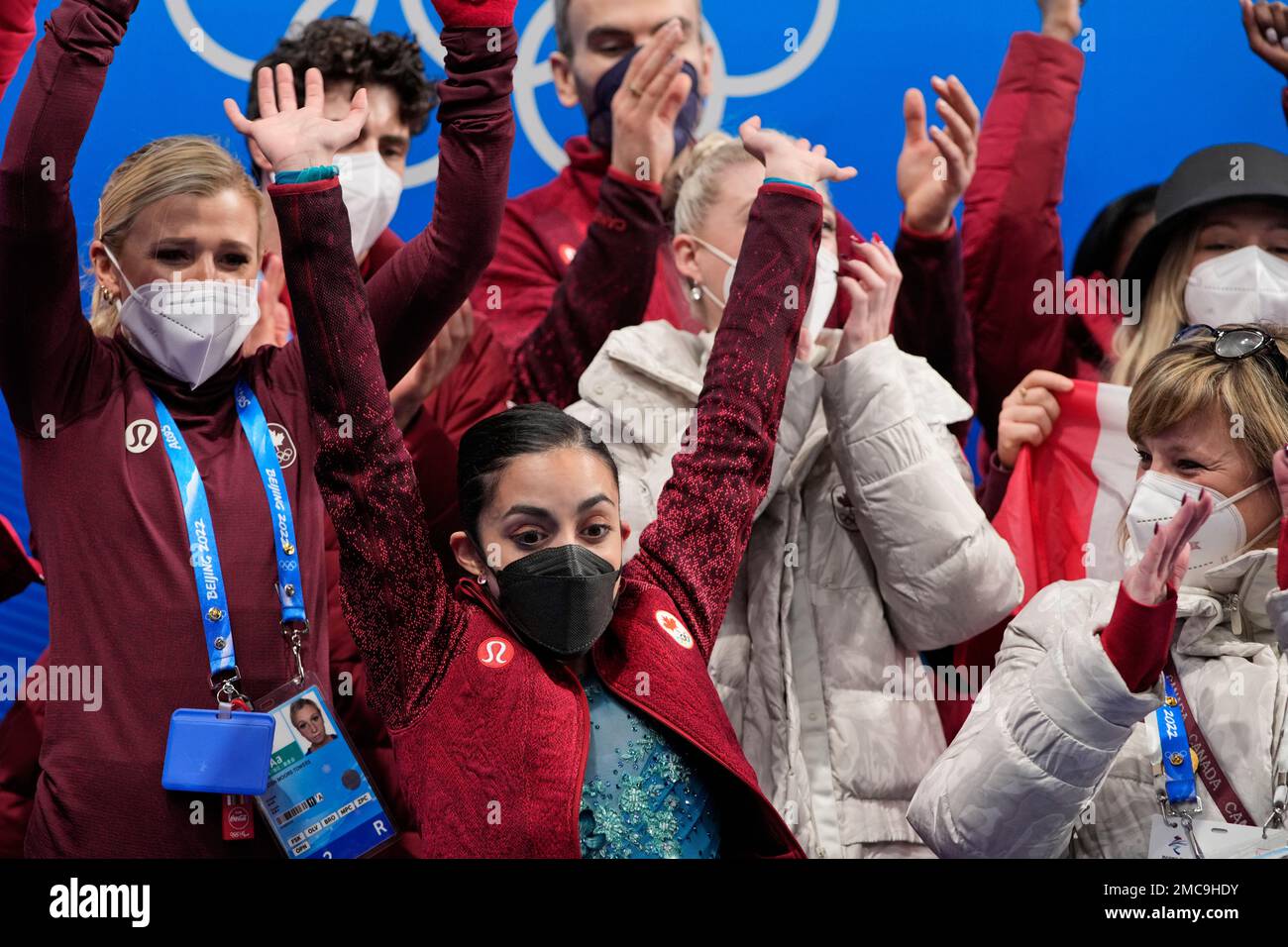 Madeline Schizas, of Canada, reacts after the women's team free skate ...