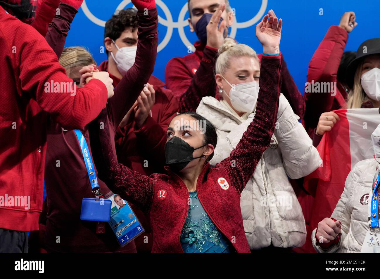 Madeline Schizas, of Canada, reacts after the women's team free skate ...