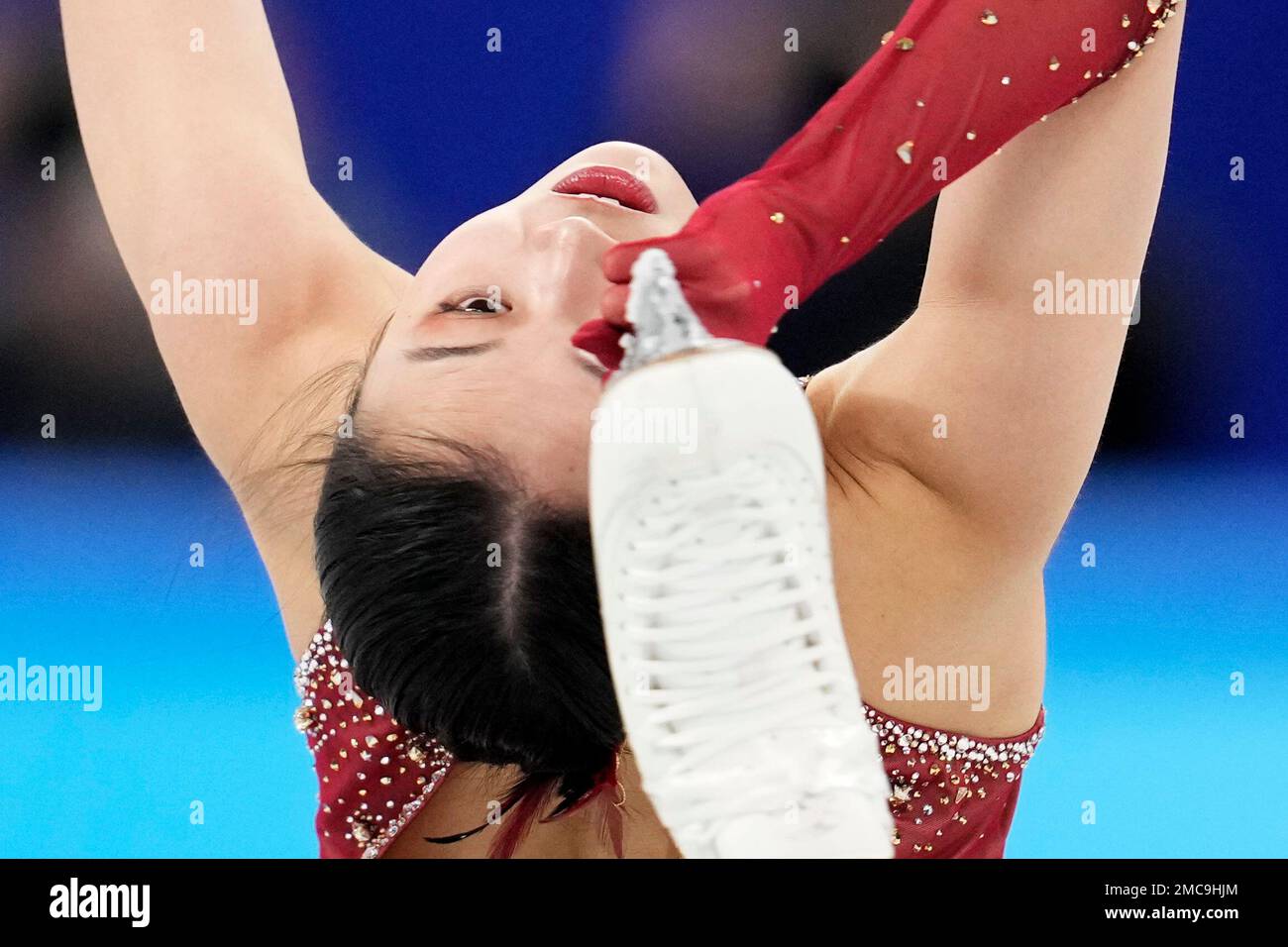 Zhu Yi, of China, competes in the women's team free skate program ...