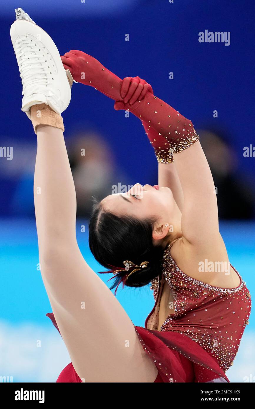 Zhu Yi, of China, competes in the women's team free skate program ...