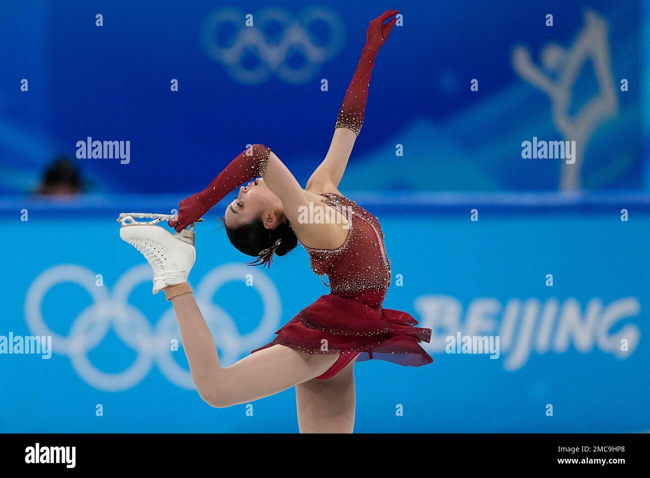 Zhu Yi, of China, competes in the women's team free skate program ...