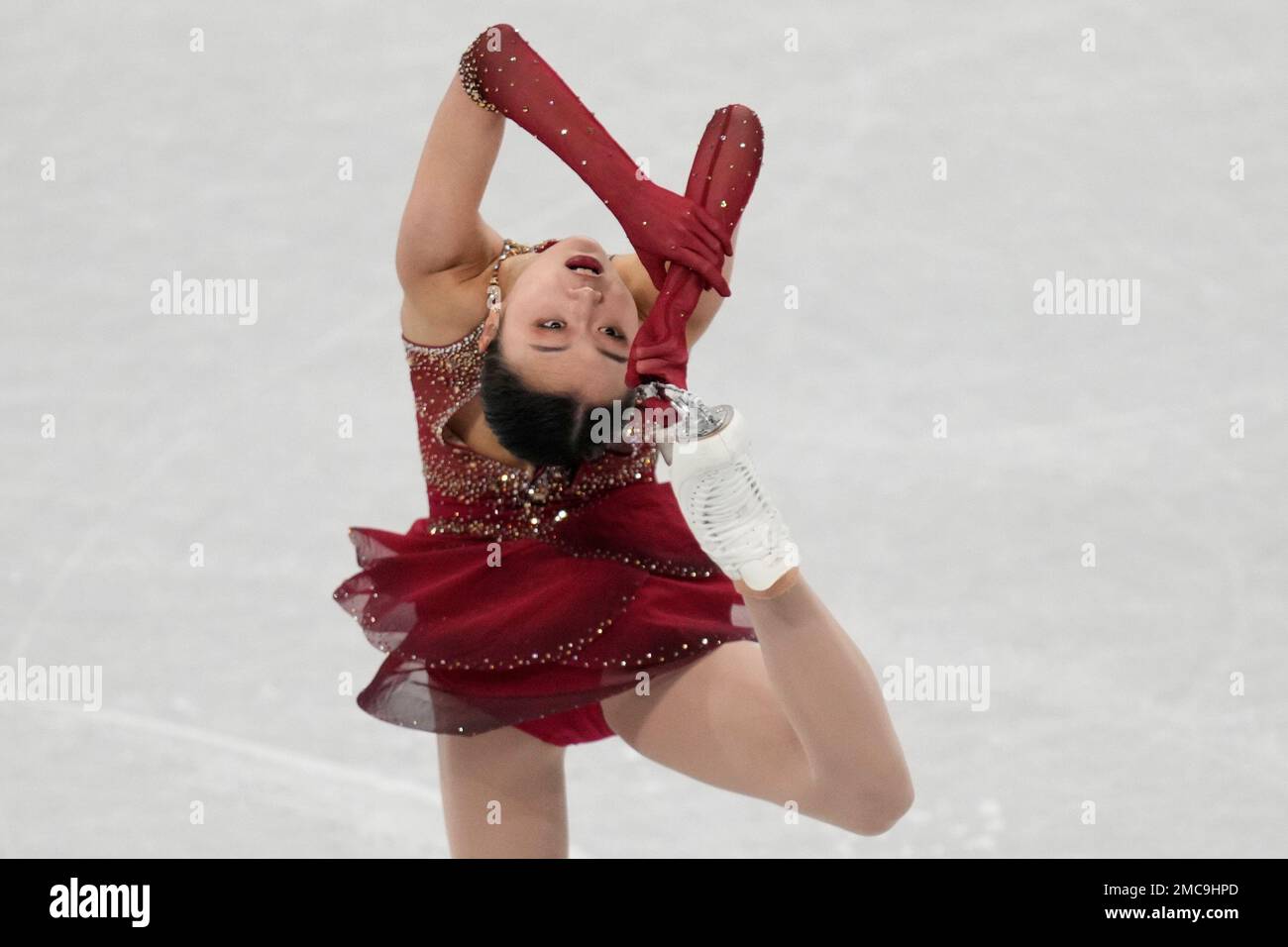 Zhu Yi, of China, competes in the women's team free skate program ...