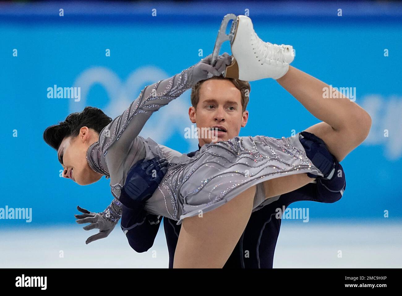 Madison Chock and Evan Bates, of the United States, compete in the team ...