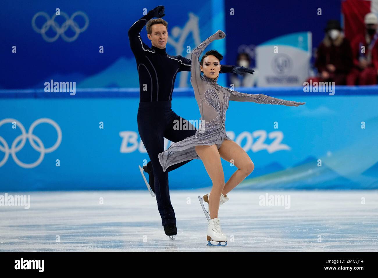 Madison Chock and Evan Bates, of the United States, compete in the team ...