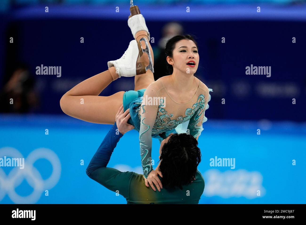 Wang Shiyue and Liu Xinyu, of China, compete in the team ice dance ...