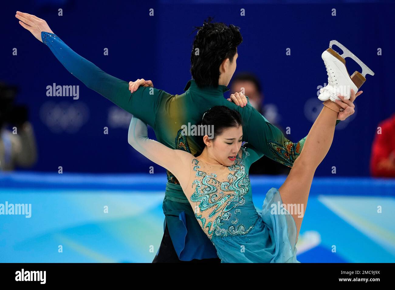 Wang Shiyue and Liu Xinyu, of China, compete in the team ice dance ...