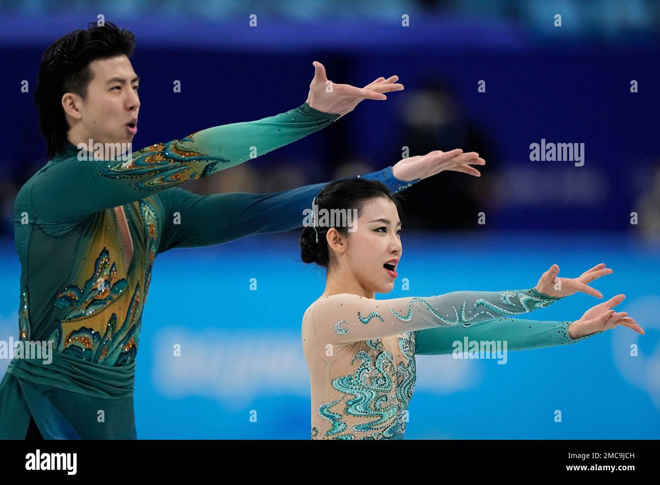 Wang Shiyue and Liu Xinyu, of China, compete in the team ice dance ...