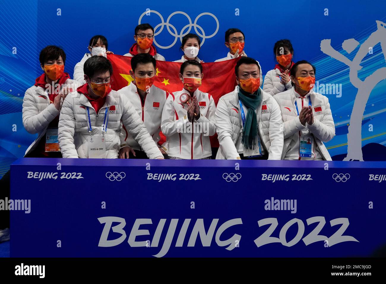 Peng Cheng and Jin Yang, of China, react after the pairs team free ...