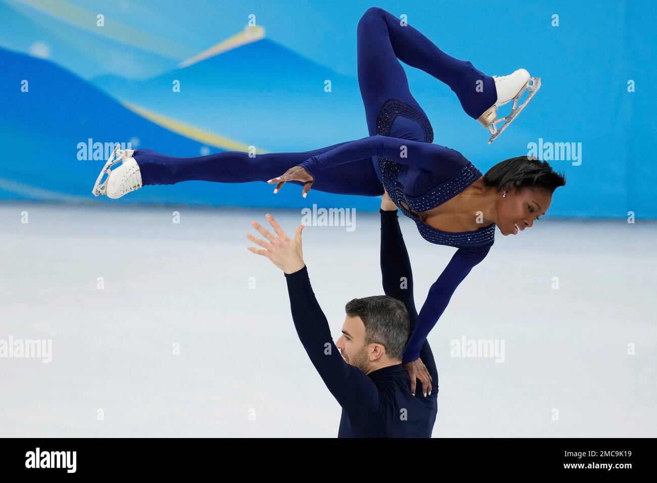 Vanessa James and Eric Radford, of Canada, compete in the pairs team ...