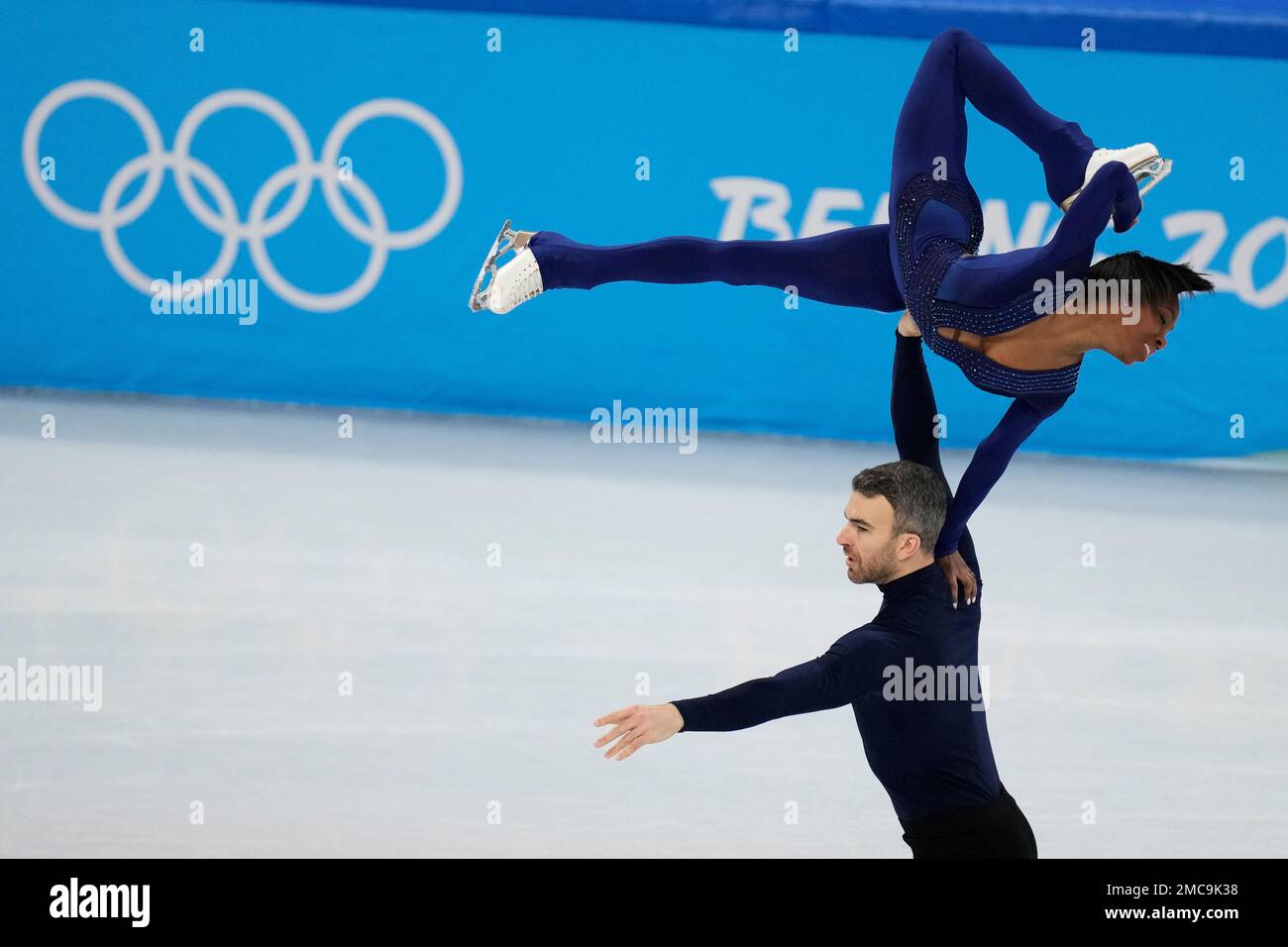 Vanessa James and Eric Radford, of Canada, compete in the pairs team ...
