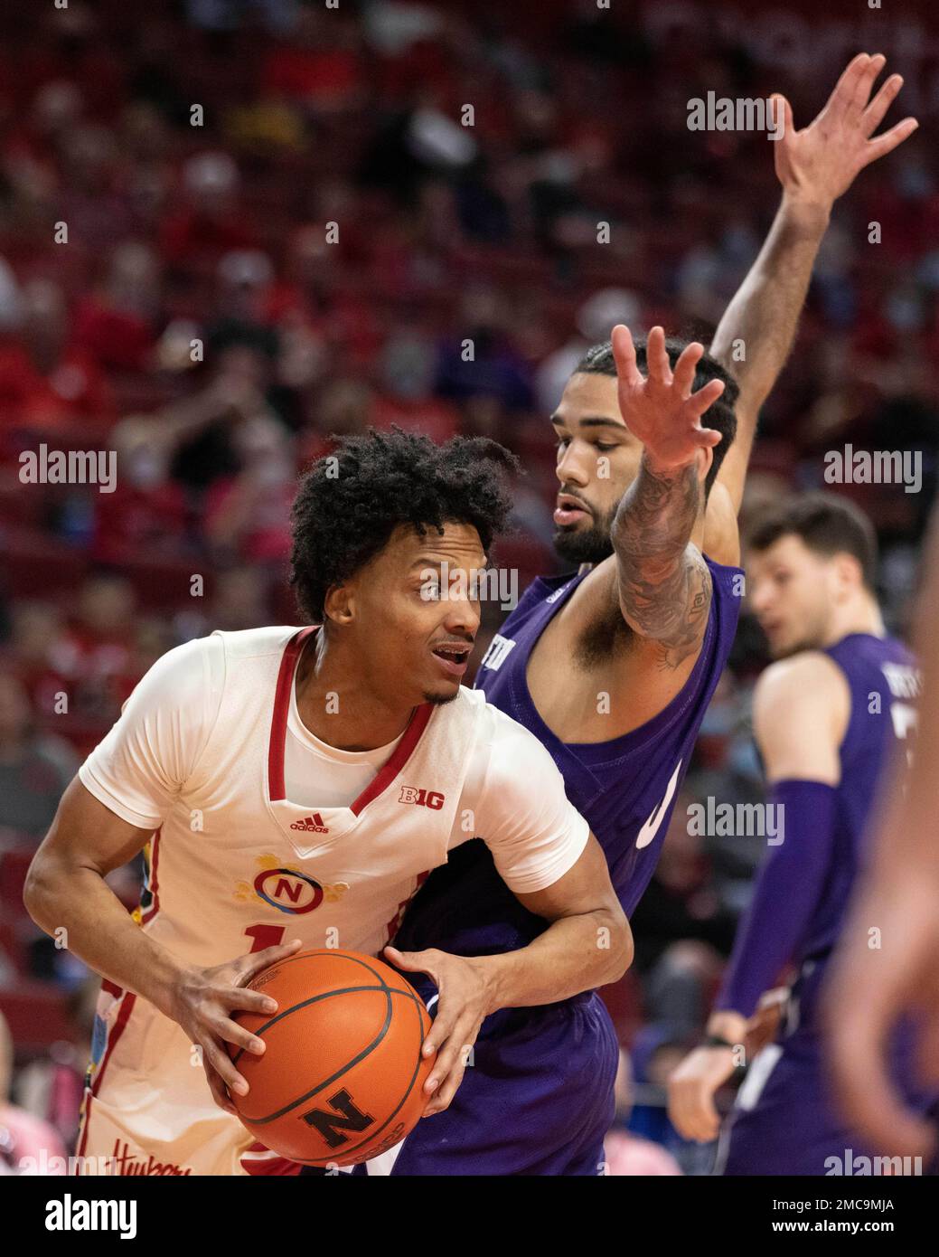 Nebraska's Alonzo Verge Jr. (1) drives against Northwestern's Boo Buie ...