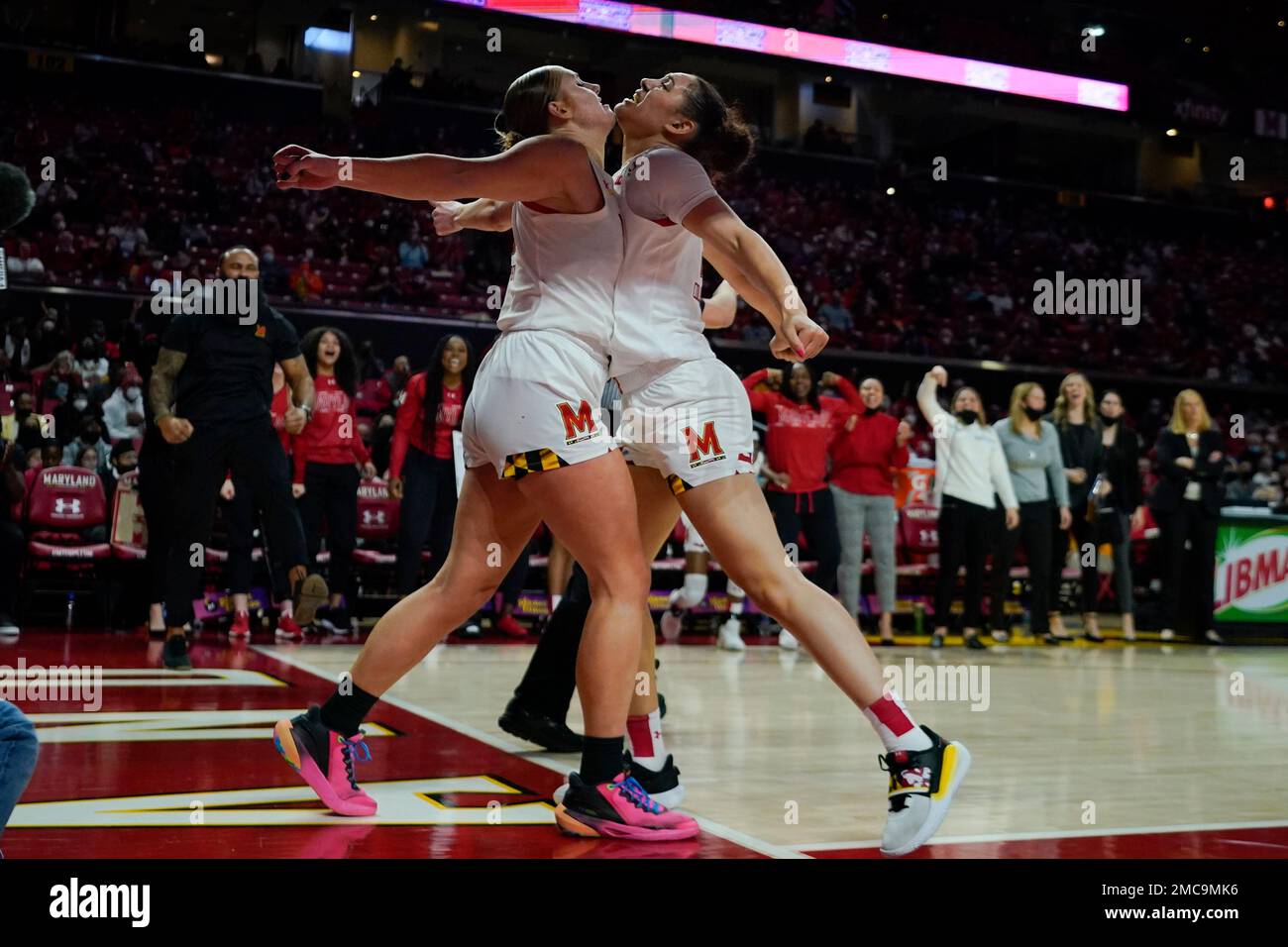 Maryland's Chloe Bibby, left, and forward Mimi Collins react after ...