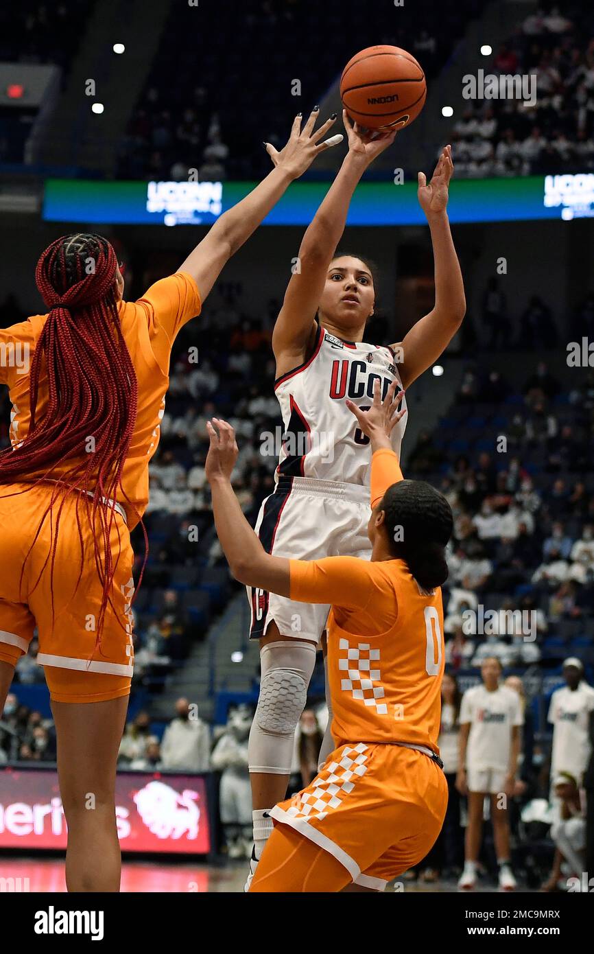 Connecticut's Azzi Fudd shoots over Tennessee's Tamari Key, left, and ...