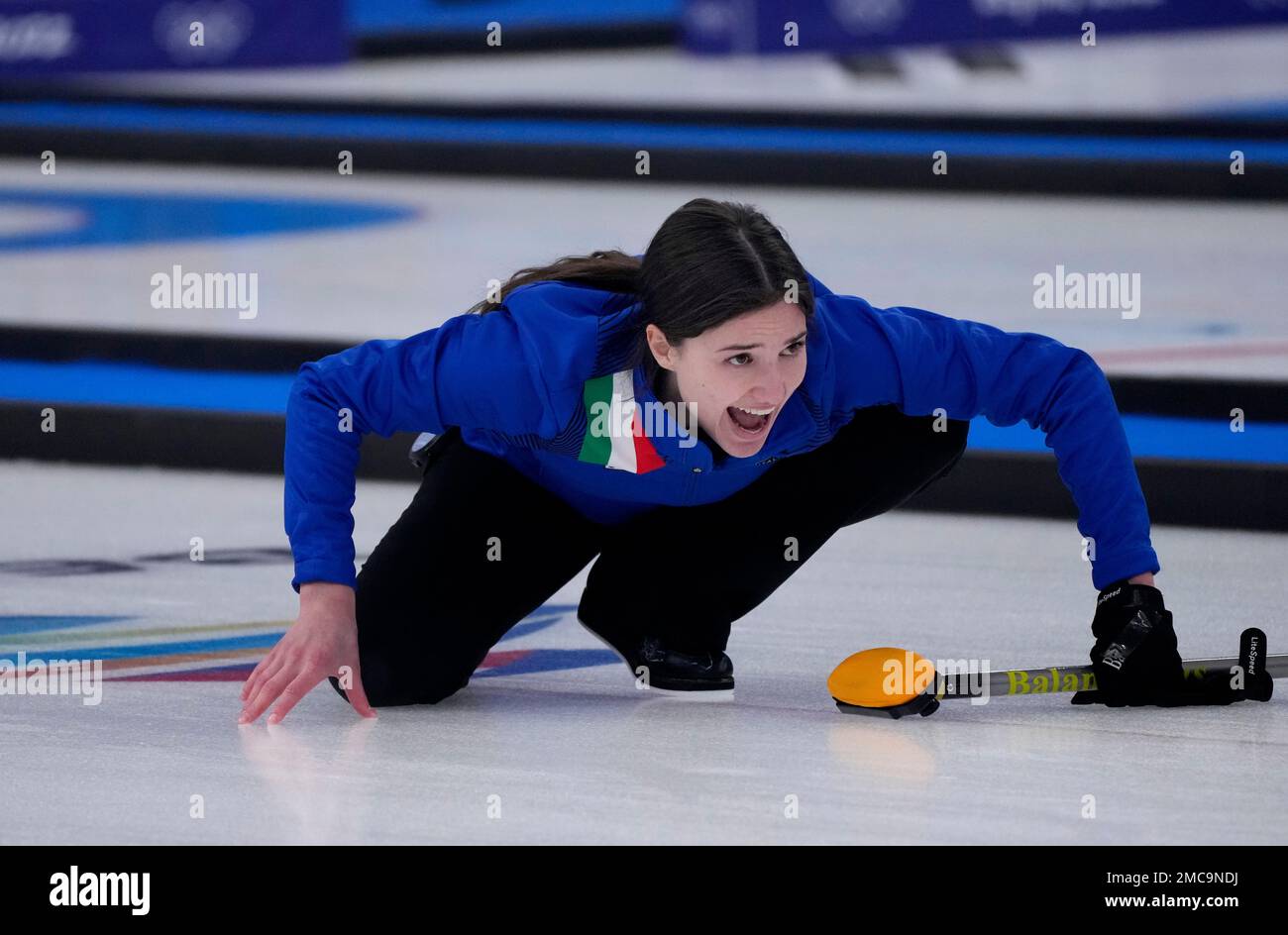 Italy's Stefania Constantini, directs her team mate, during the mixed ...