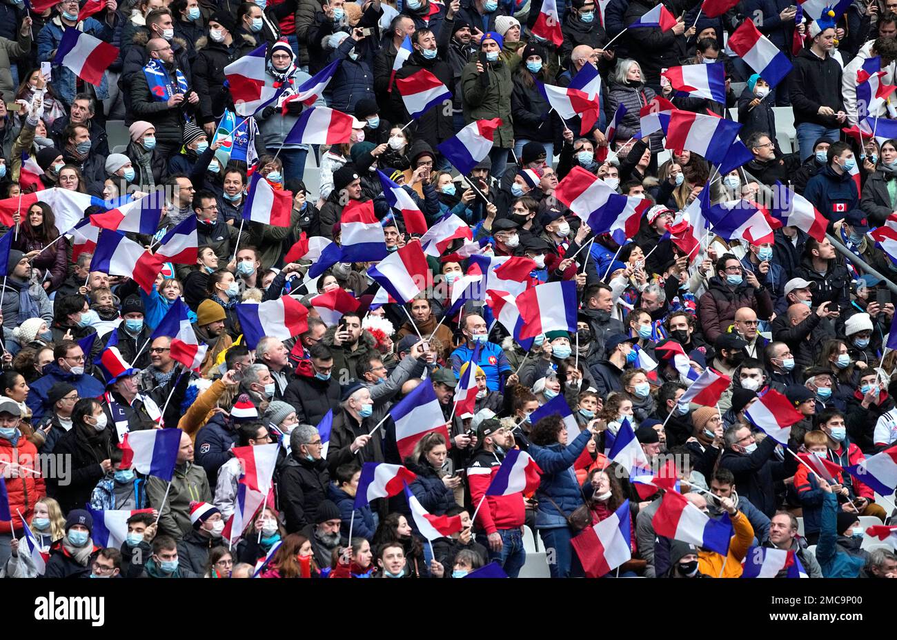 Fans wave flags prior to the Six Nations rugby union match between ...