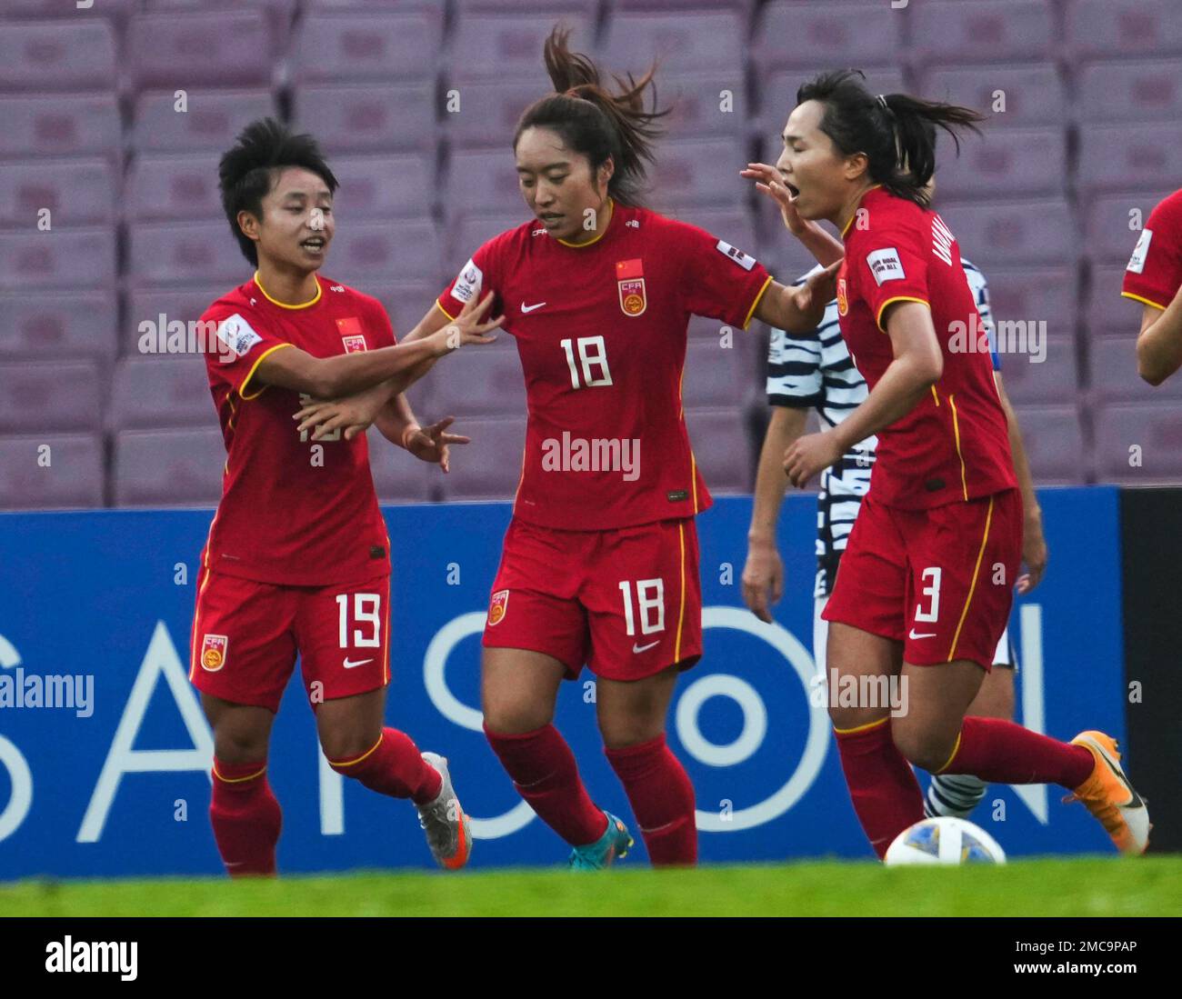 China's Kang Gaae and Kim Jung-mi celebrates after scoring a goal ...