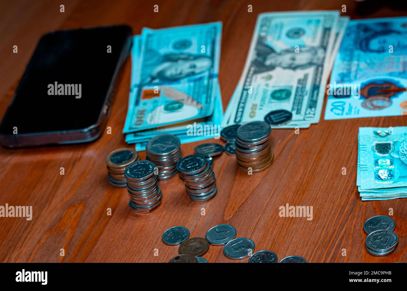 business man holding a coin cost support and saving money financial ...