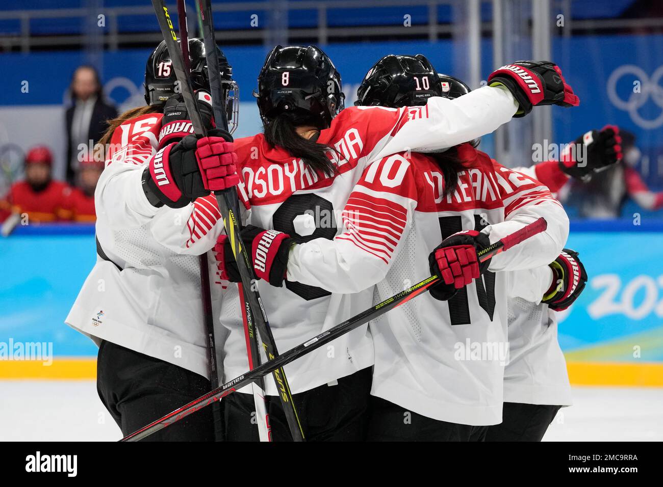 Japan's Akane Hosoyamada (8) is congratulated after scoring a goal ...