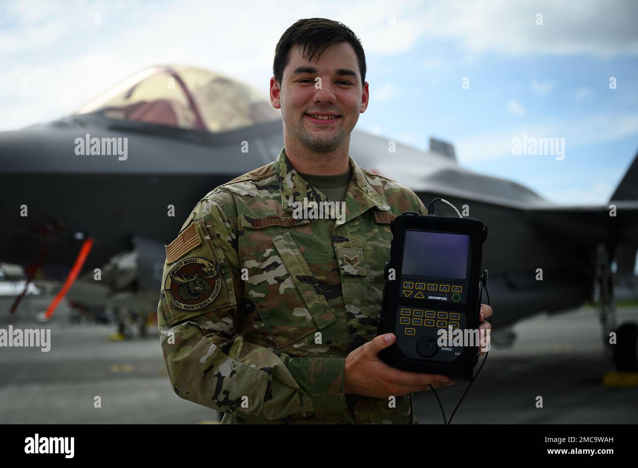 U.S. Air Force Senior Airman Thomas Burgess, a 356th Expeditionary ...