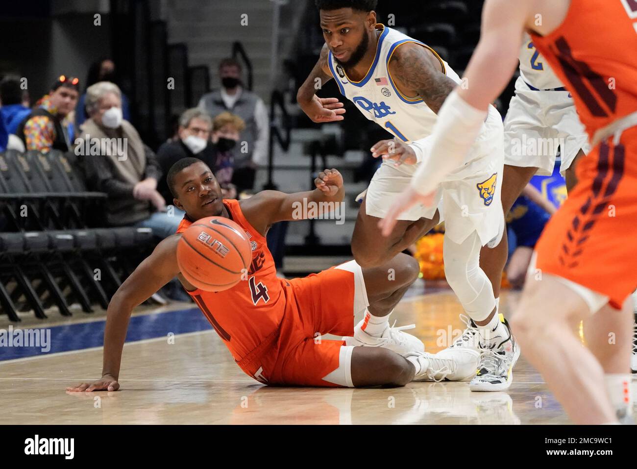 Pittsburgh's Jamarius Burton, right, and Virginia Tech's Nahiem Alleyne ...
