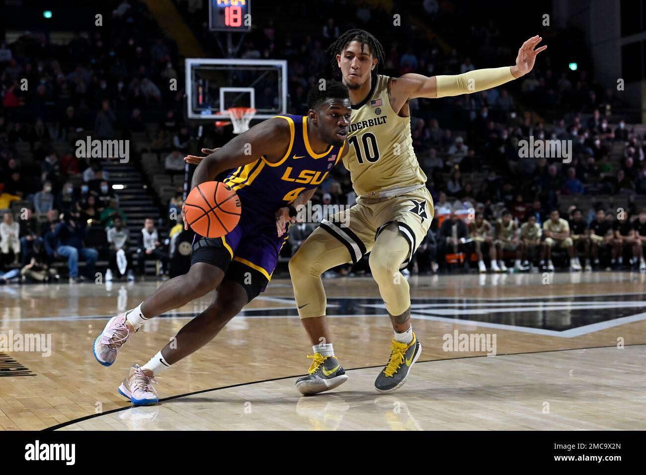LSU forward Darius Days (4) drives against Vanderbilt forward Myles ...