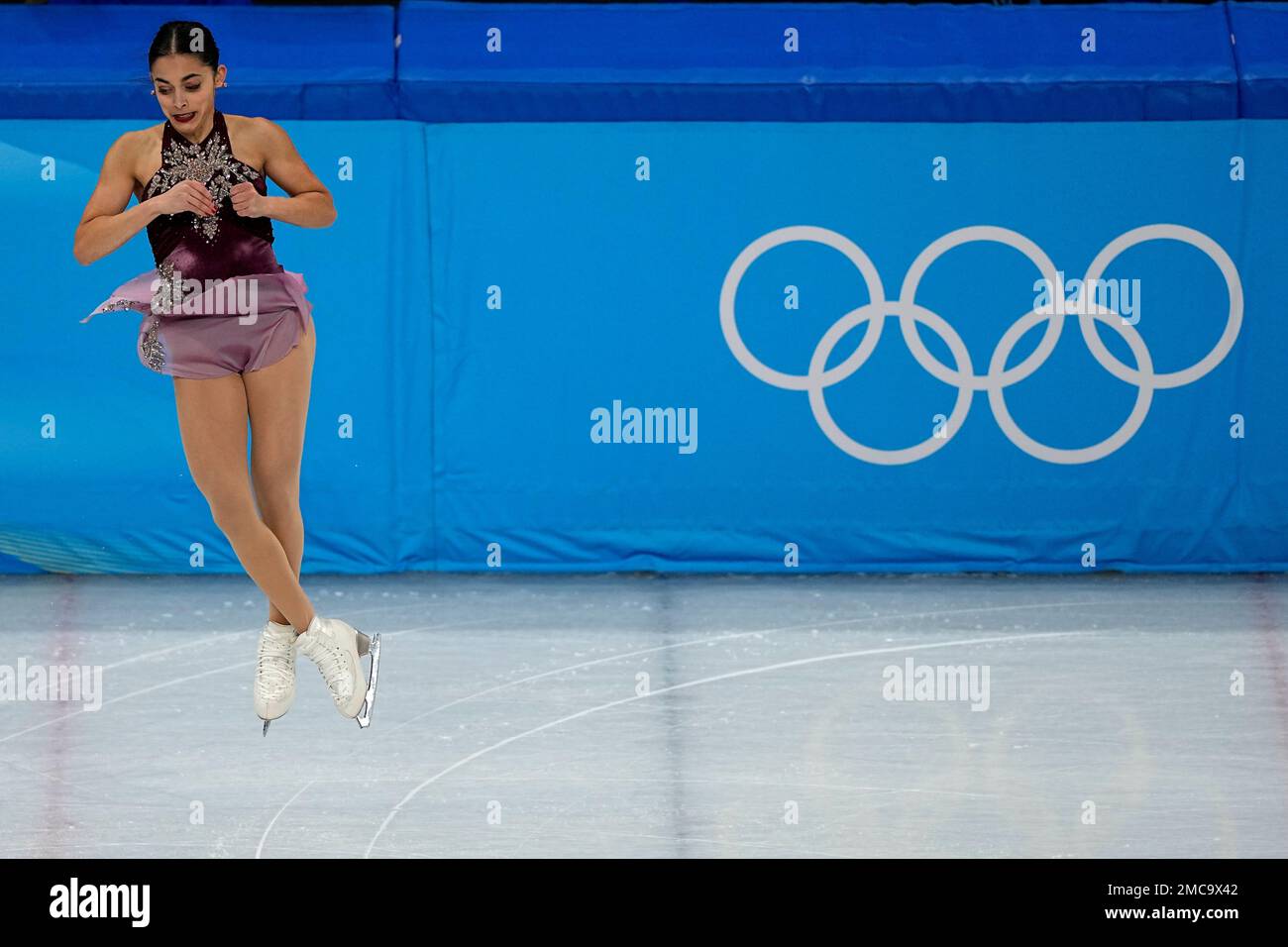 Madeline Schizas, of Canada, competes in the women's short program team ...