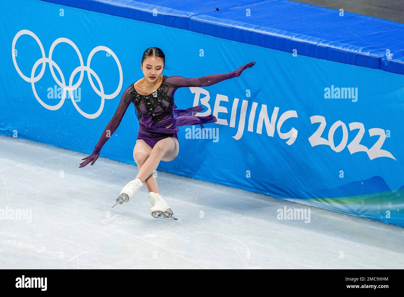 Zhu Yi, of China, falls in the women's short program team figure ...