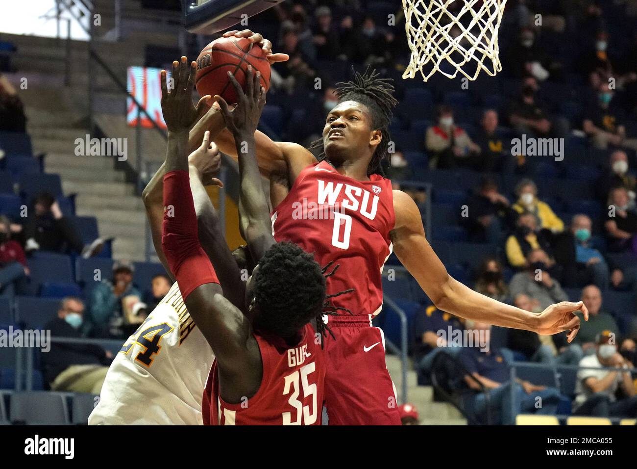 Washington State forward Efe Abogidi (0) blocks a shot by California ...