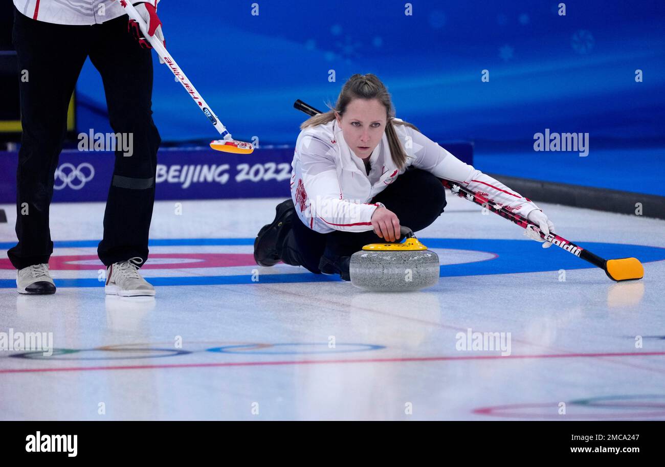 Canada's Rachel Homan, throws a rock, during the mixed doubles match ...