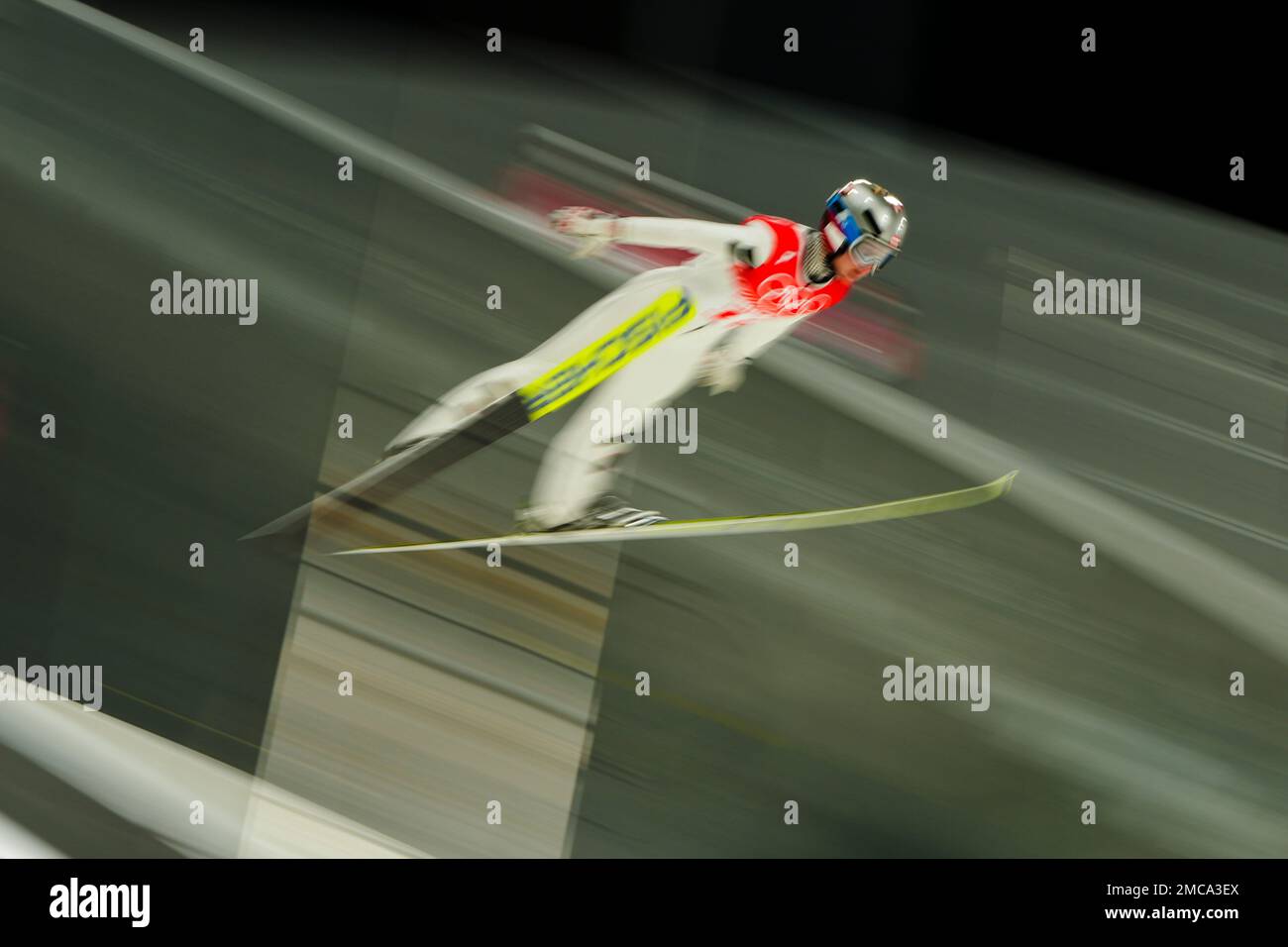 Sophie Sorschag, of Austria, soars through the air during the women's ...