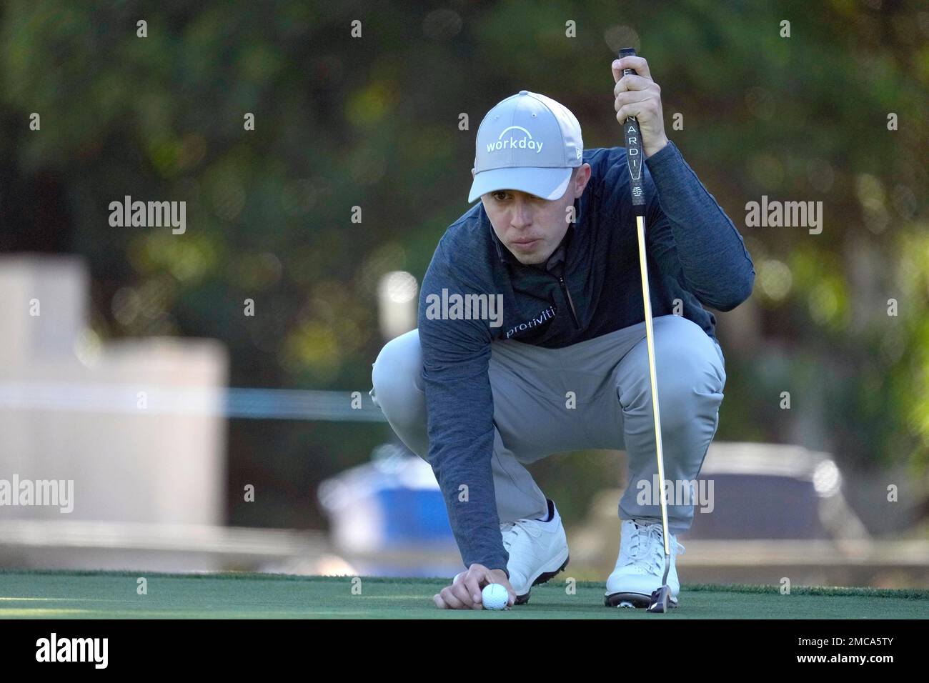 Matthew Fitzpatrick lines up a putt on the fourth green of the Monterey ...