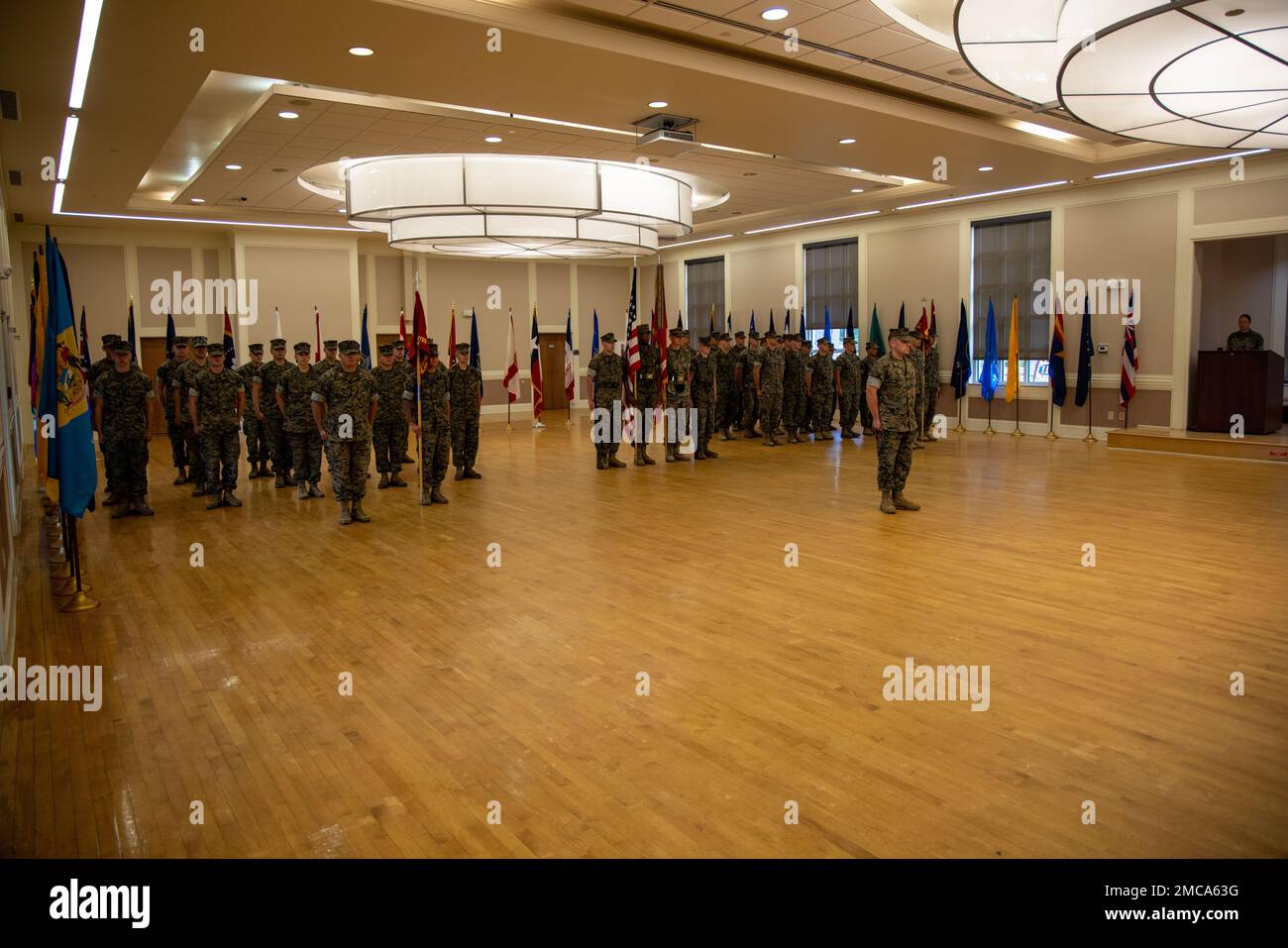 U.S. Marines with the 2d Intelligence Battalion stand in formation as the Marine Corps Hymn ...