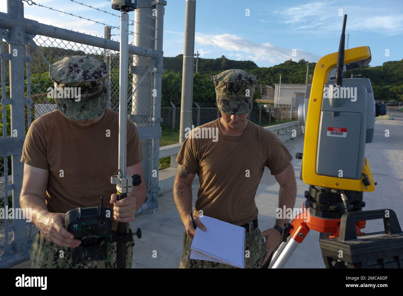U.S. Navy Engineering Aide 3rd class Sean McNeill, left, and U.S. Navy ...