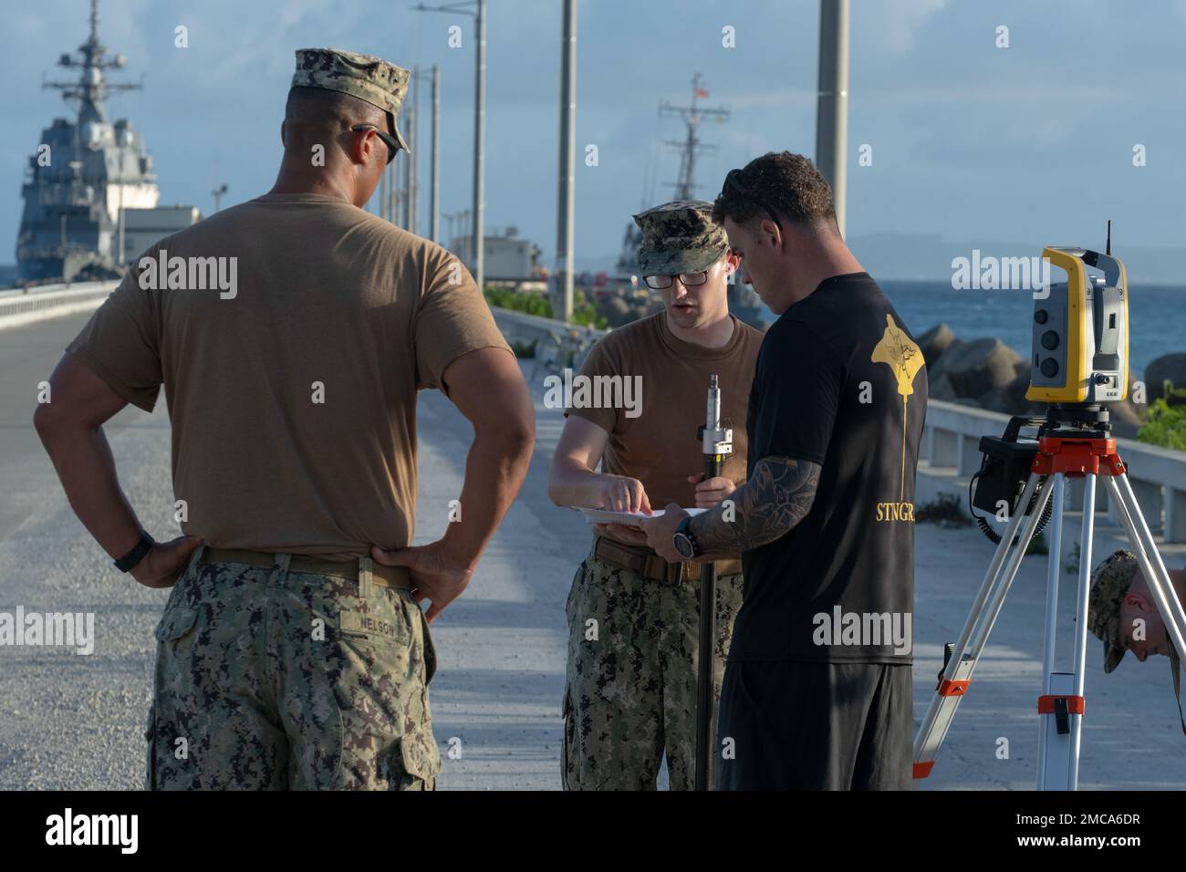 U.S. Navy Senior Chief Petty Officer Darryn Nelson, left, and ...