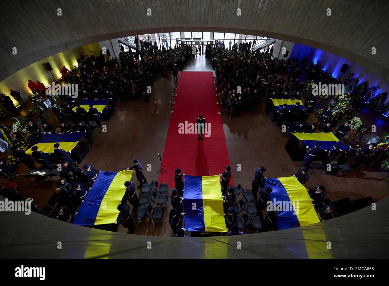 Kyiv, Ukraine. 21st Jan, 2023. Ukrainian honor guards drape flags on ...