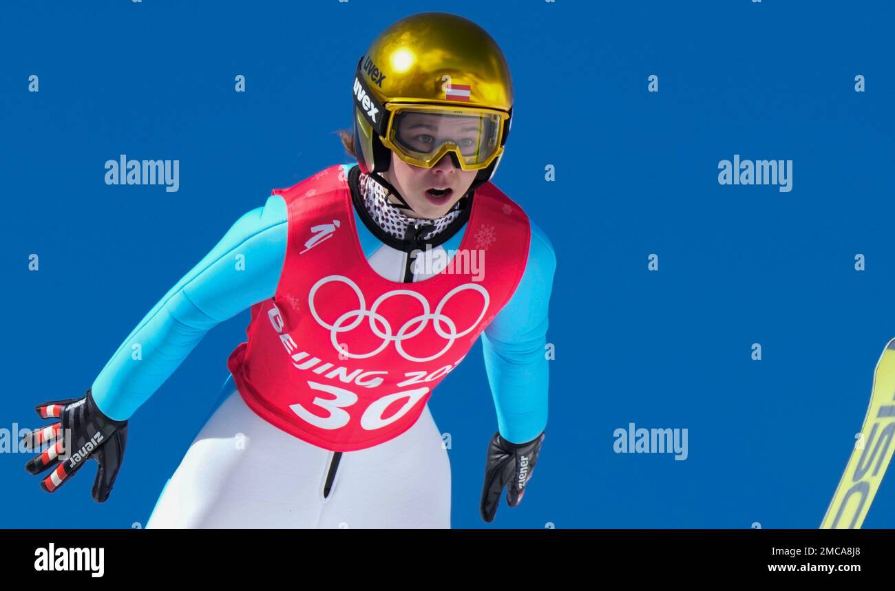 Lisa Eder, of Austria, soars through the air during a women's normal ...