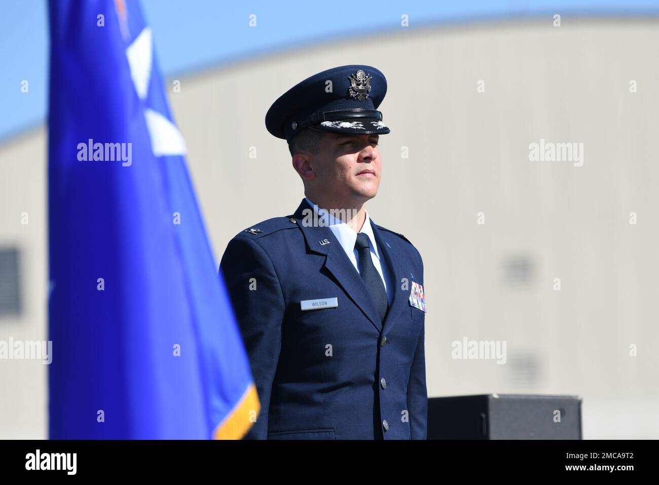 U.S. Air Force Col. David Wilson stands at attention during the 673d ...