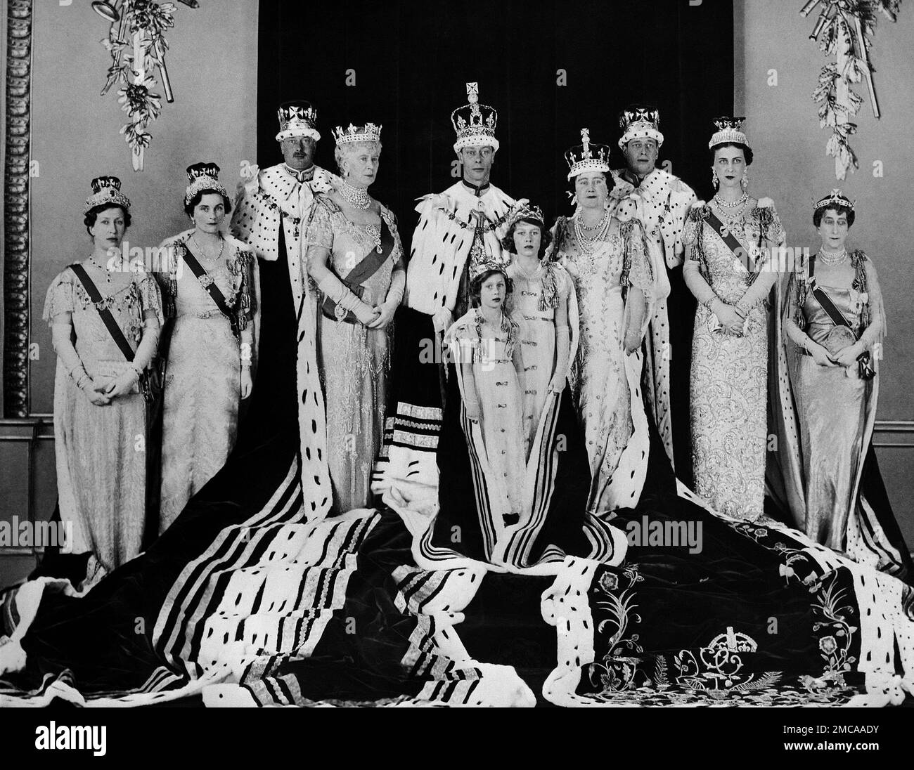 FILE - Britain's King George VI, centre, poses with his wife Queen ...