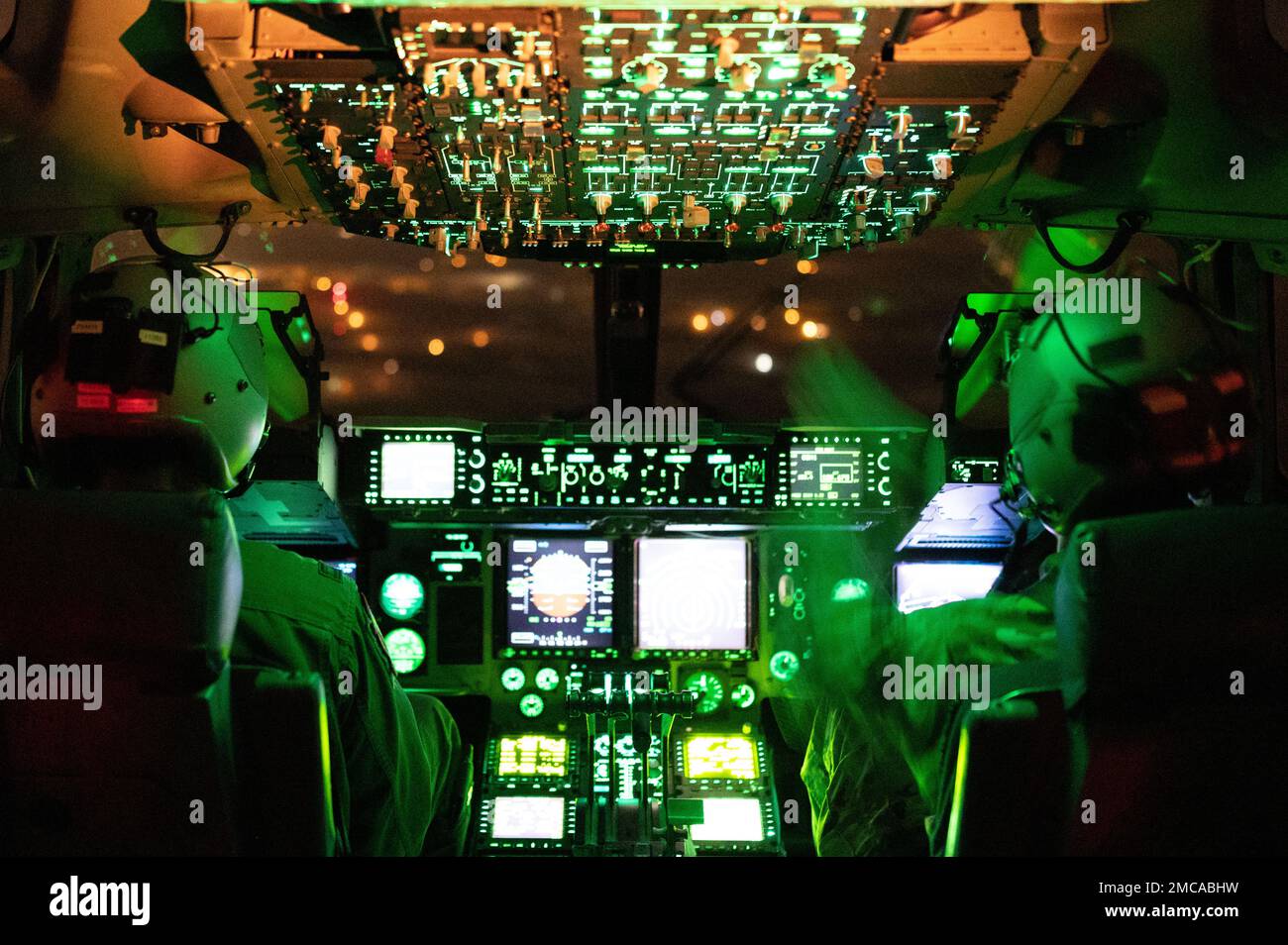 U.S. Air Force Capts. Brandon Dumais, and Tanner Cook, C-17 Globemaster ...