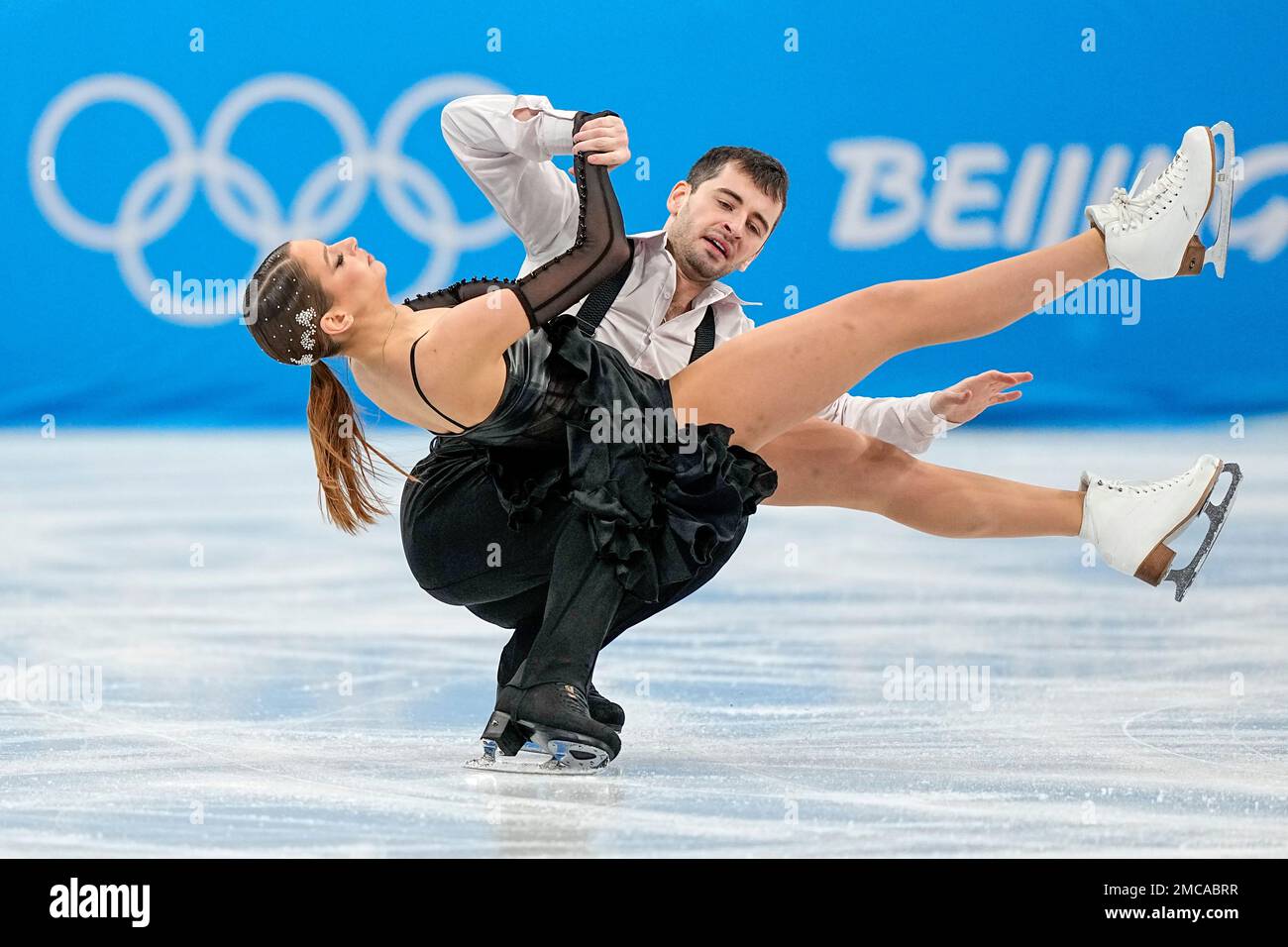 Oleksandra Nazarova, left, and Maksym Nikitin, of the Ukraine, compete during the ice dance team ...