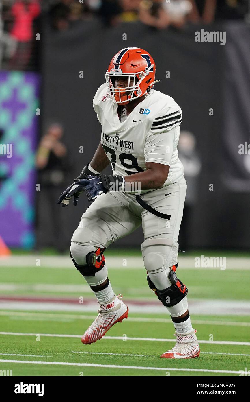 East offensive lineman Vederian Lowe, of Illinois, (79) in action ...