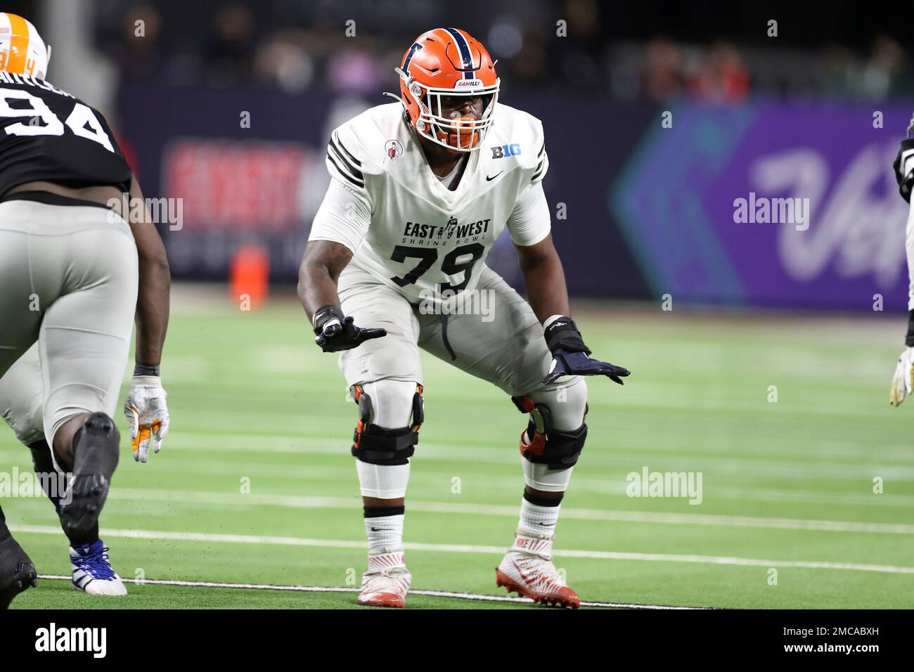 East offensive lineman Vederian Lowe, of Illinois, (79) in coverage ...
