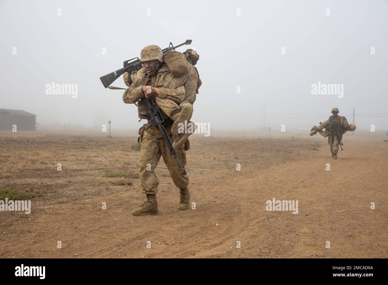 Firemans carry hi-res stock photography and images - Alamy