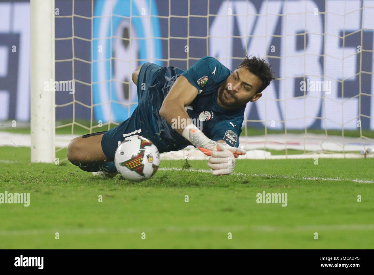Egypt's goalkeeper Mohamed Abou Gabal saves a penalty during the ...