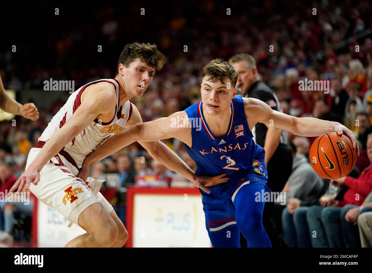 Kansas guard Christian Braun, right, drives past Iowa State guard Caleb ...