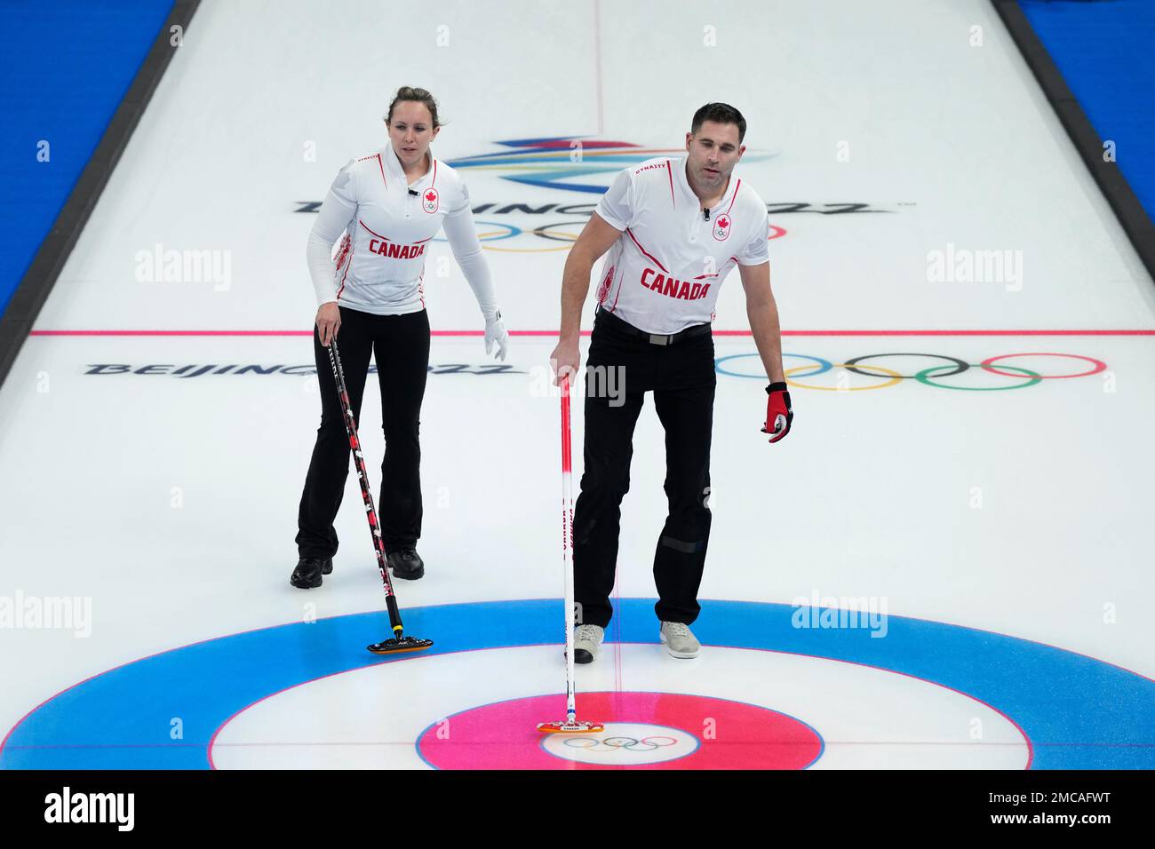 Canada's Rachel Homan and John Morris compete against Norway during the ...